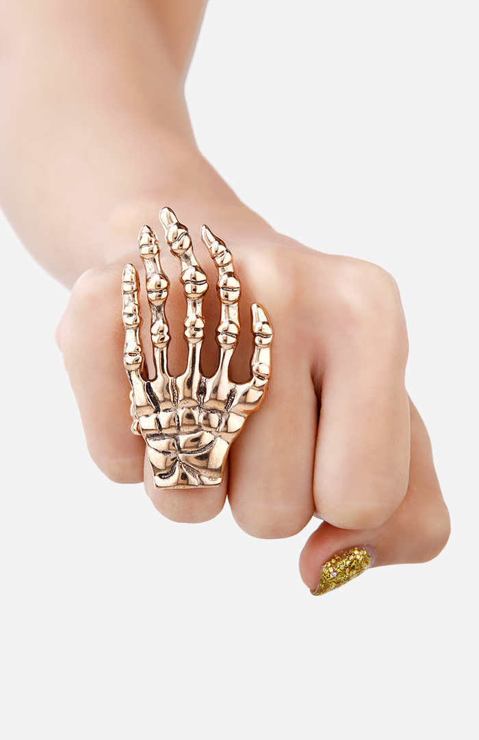 Skeleton Hand Ring in Gold | DAILYLOOK